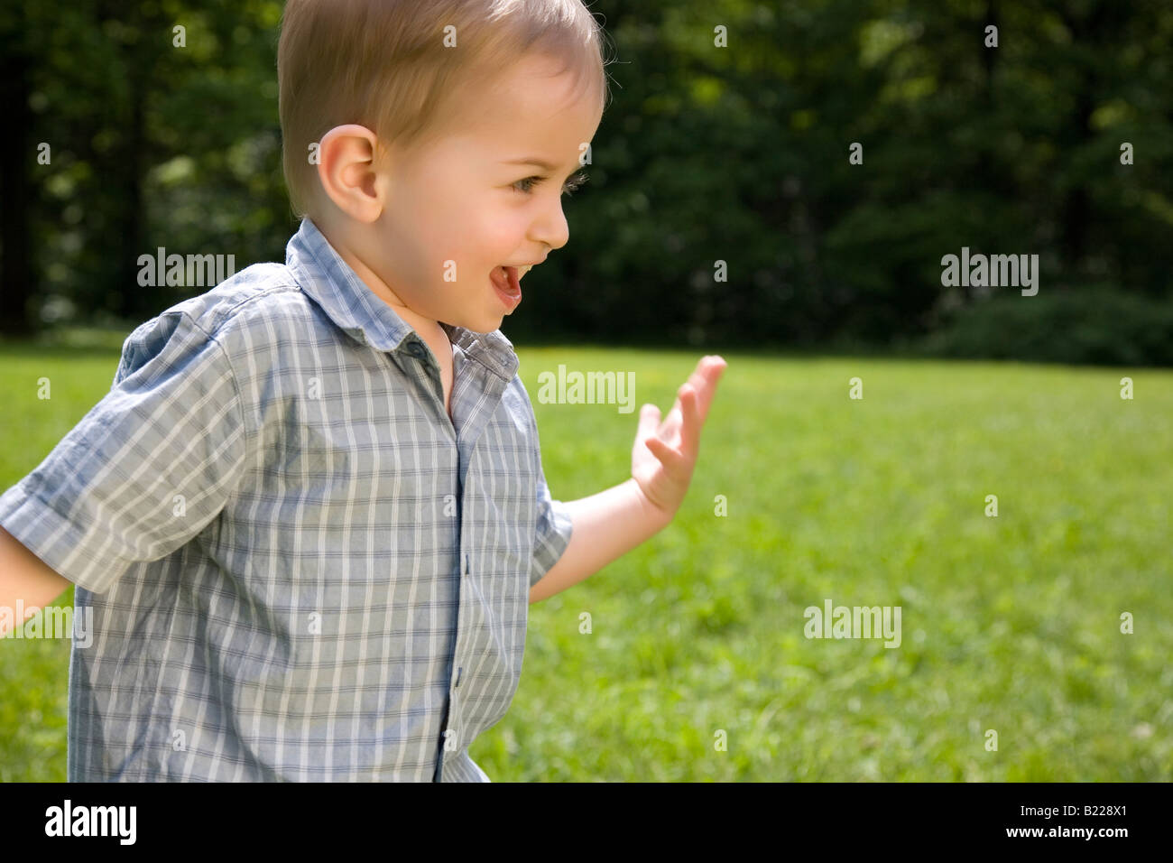 Running Baby Boy. Summer Time Stock Photo - Alamy