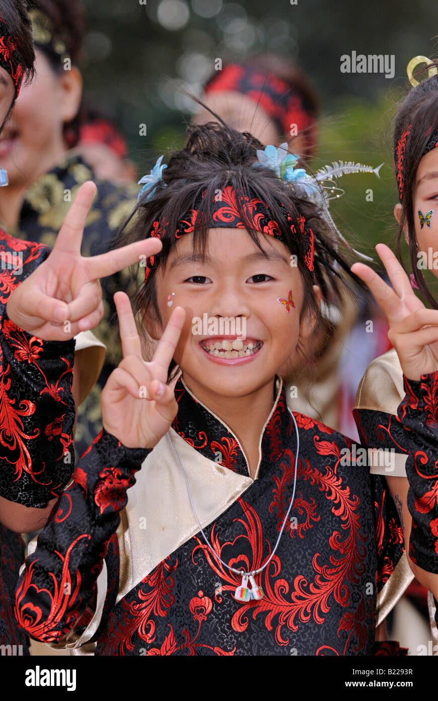Japanese girls in traditional costumes showing V sign at Michinoku ...