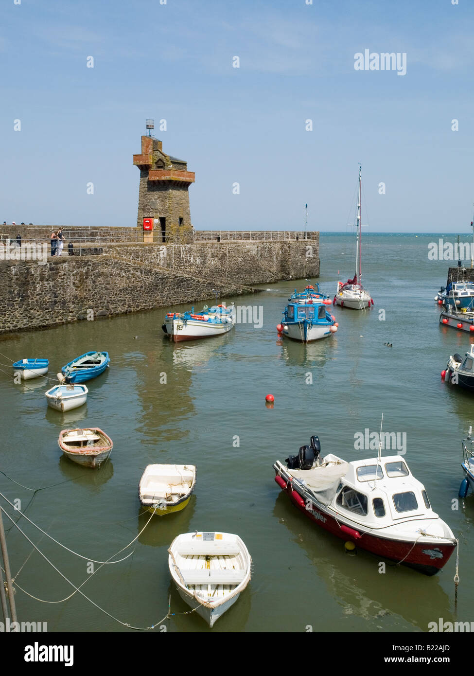 Boats in the harbour in the village of Lynmouth, North Devon England UK ...