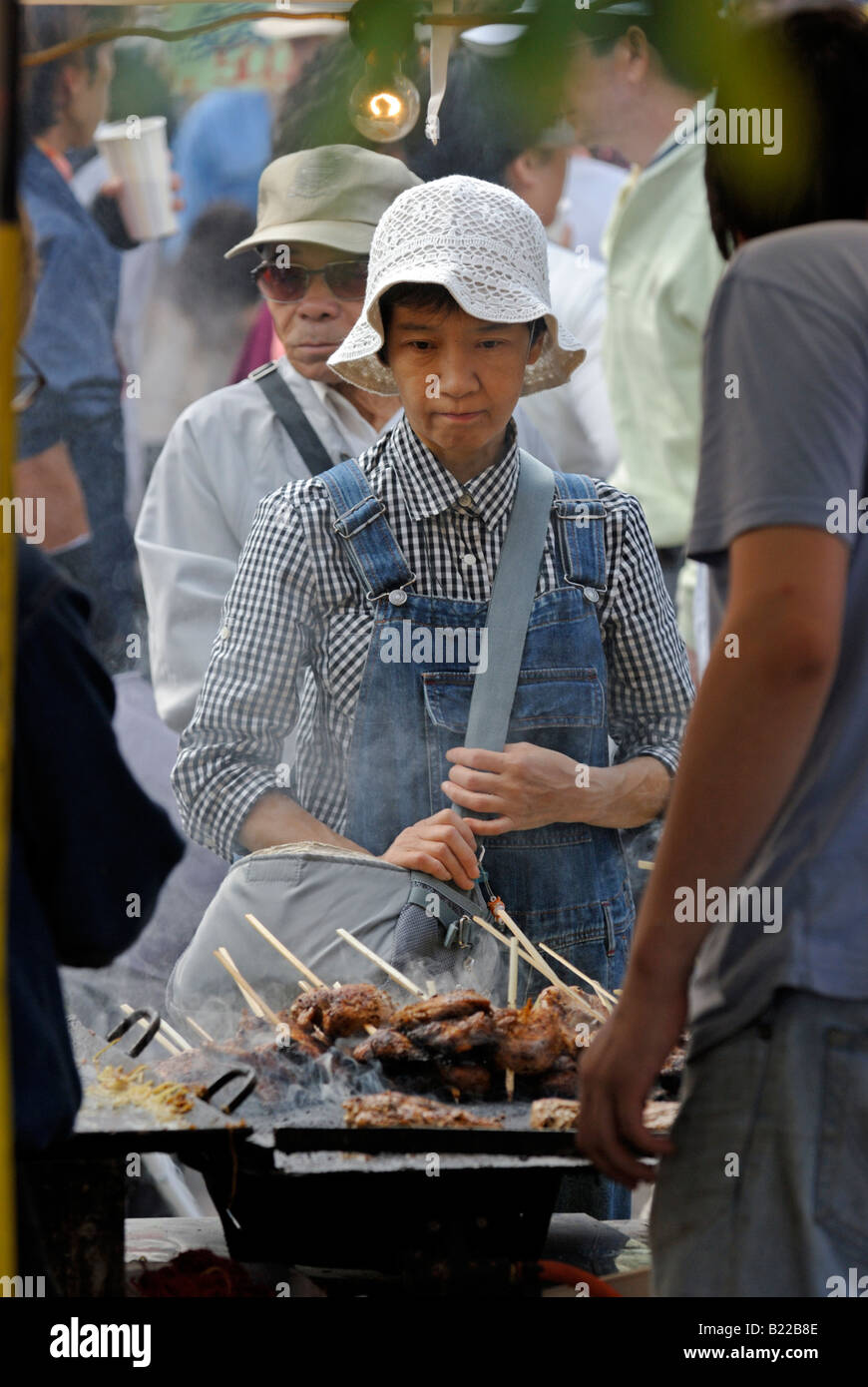 Japanese woman staring at food Sendai Japan Stock Photo - Alamy