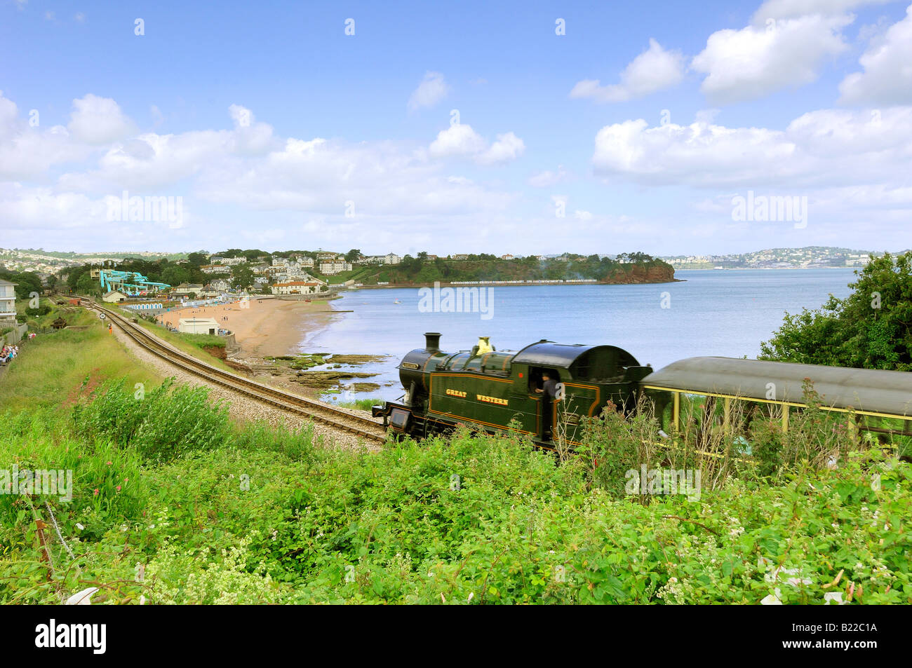 A steam train on the Paignton to Dartmouth line passing Goodrington ...