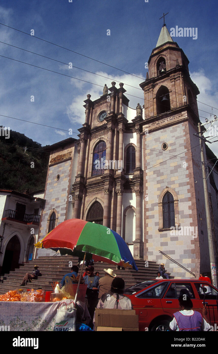 Church on the main plaza of the old mining town of Angangueo, Michoacan ...