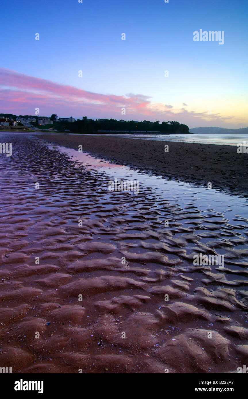 Just before dawn on the foreshore at Goodrington Sands in South Devon ...