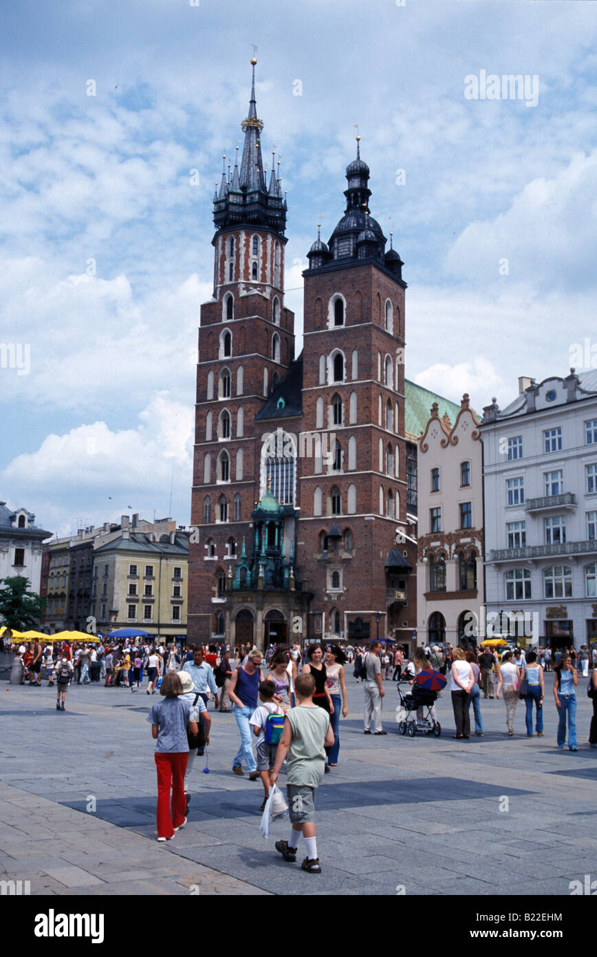 People crossing main Market Square towards St Mary s Church Cracow ...