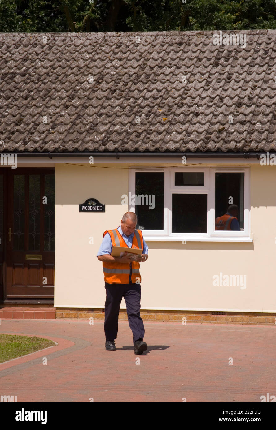 English postman uniform hi-res stock photography and images - Alamy