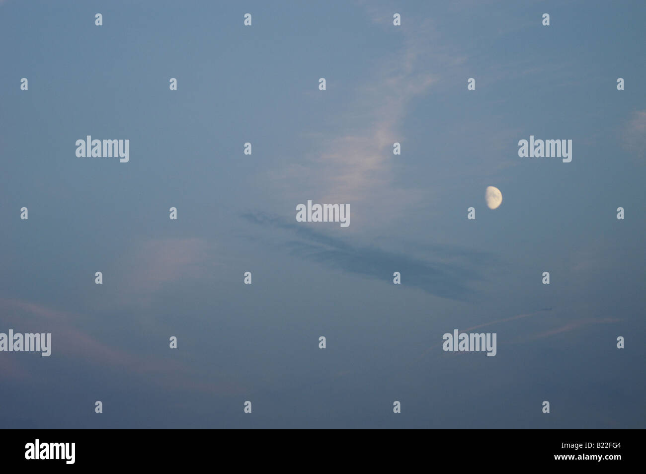 moon at sunset Stock Photo - Alamy