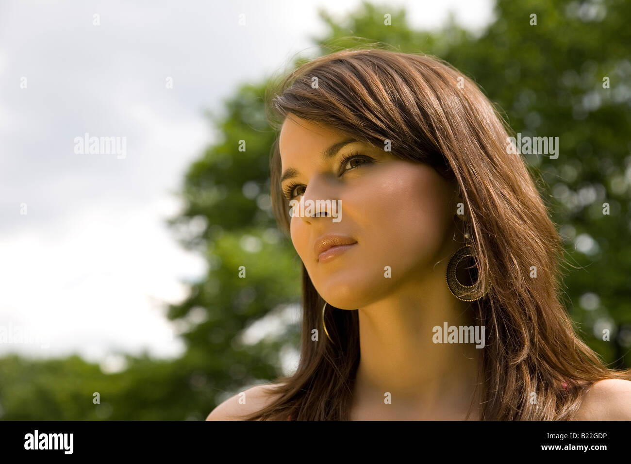 Young Woman Under The Sun Stock Photo - Alamy