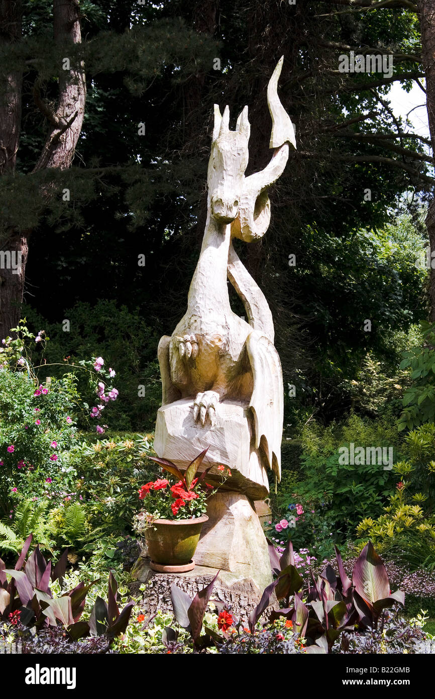 Welsh dragon carved in situ from rooted stump of broken tree Stock ...