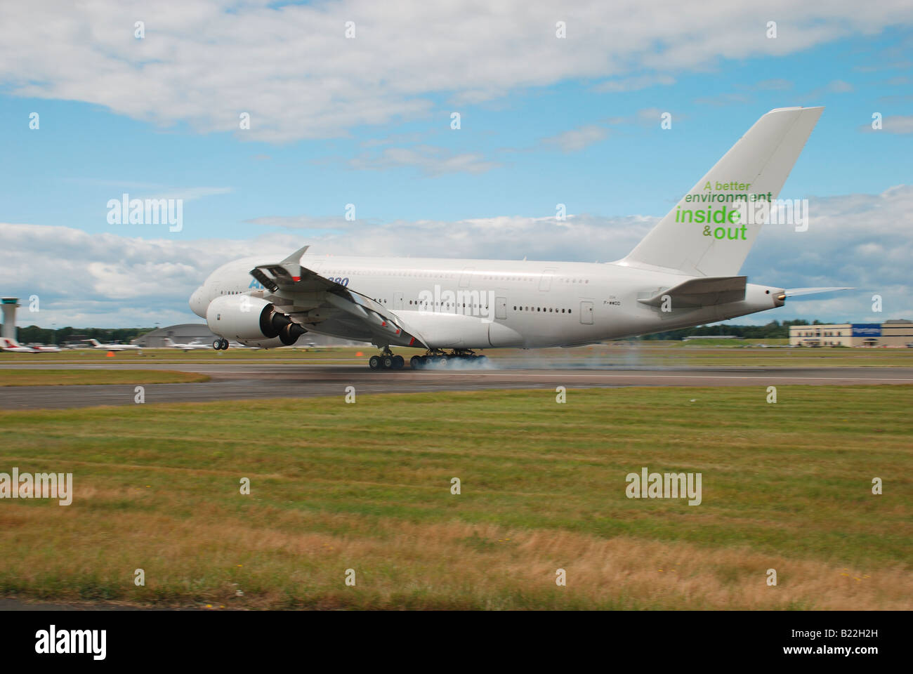 airbus industries A380 landing at farnborough 2008 with smoke coming ...