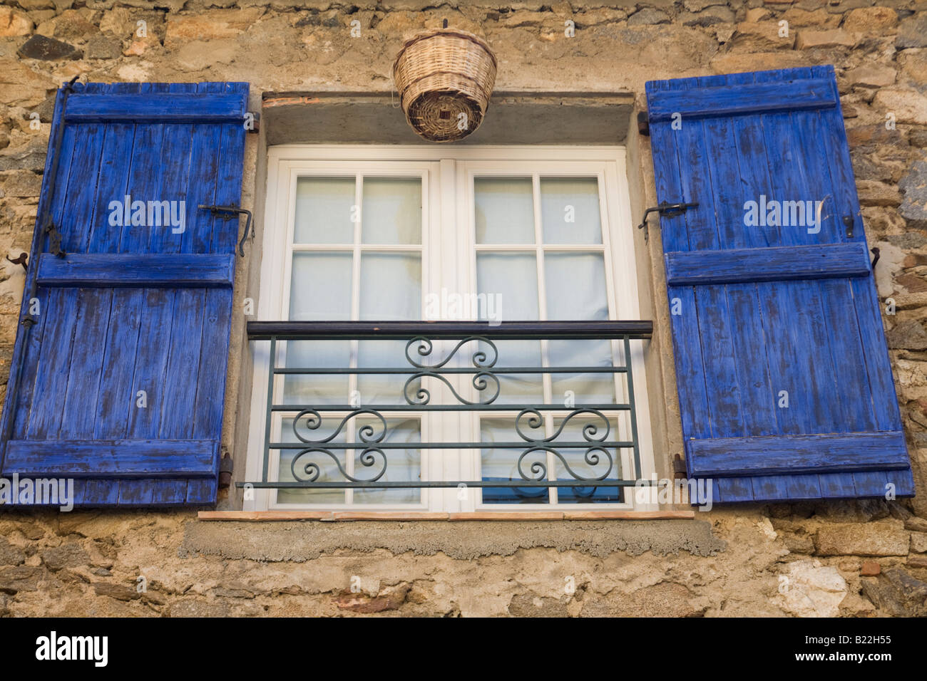 Provencal window with deep blue lavender colour shutters Stock Photo ...