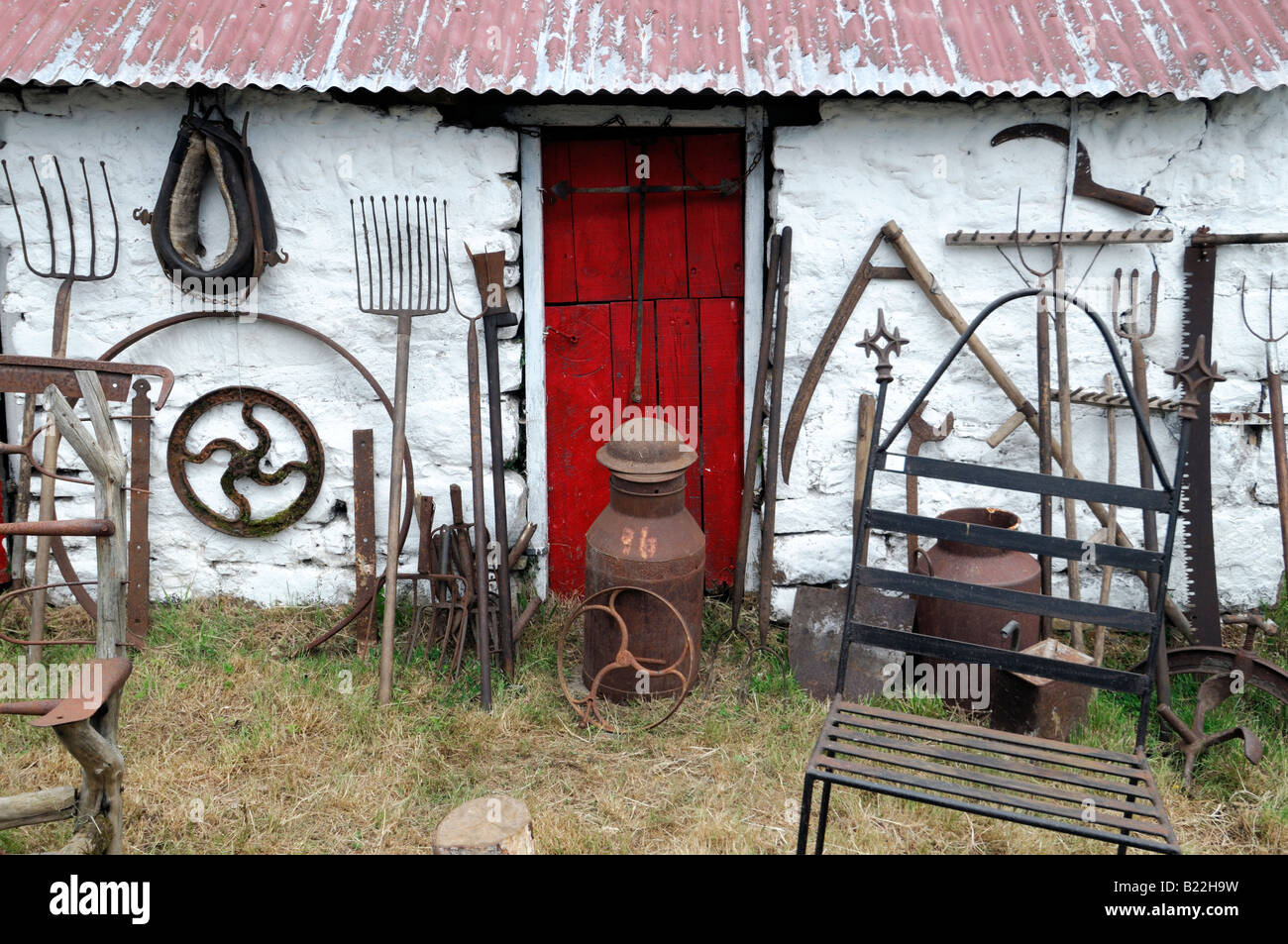 collection of decorative and functional metal work pieces implement and ...