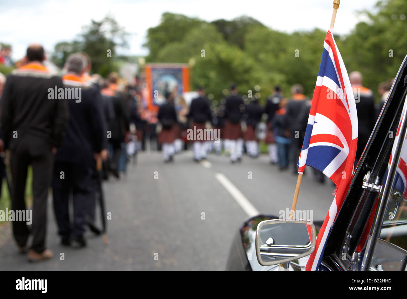 car carrying union flag part of a loyal orange lodge parade during 12th ...