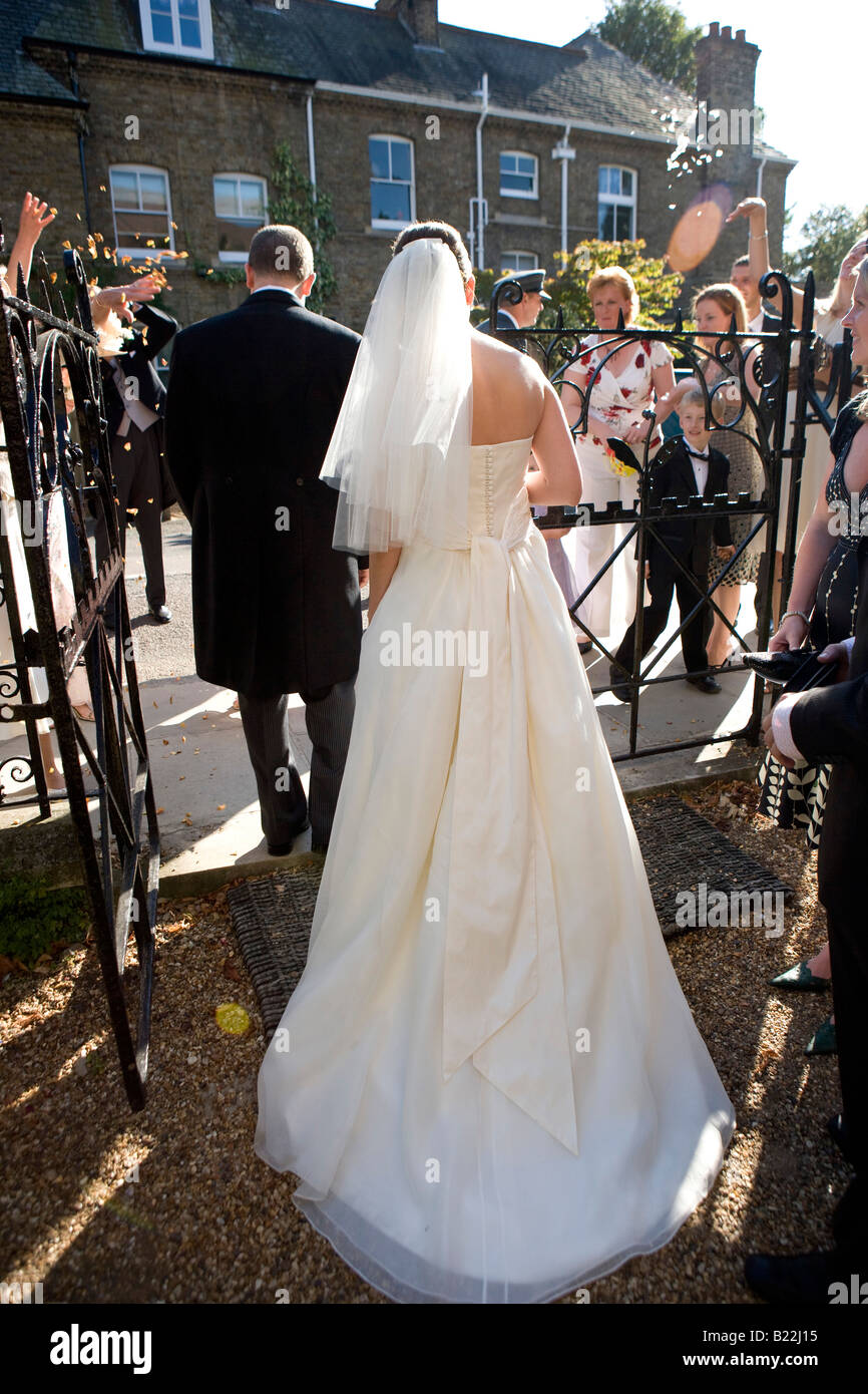 couple leaving church after wedding ceremony Stock Photo - Alamy