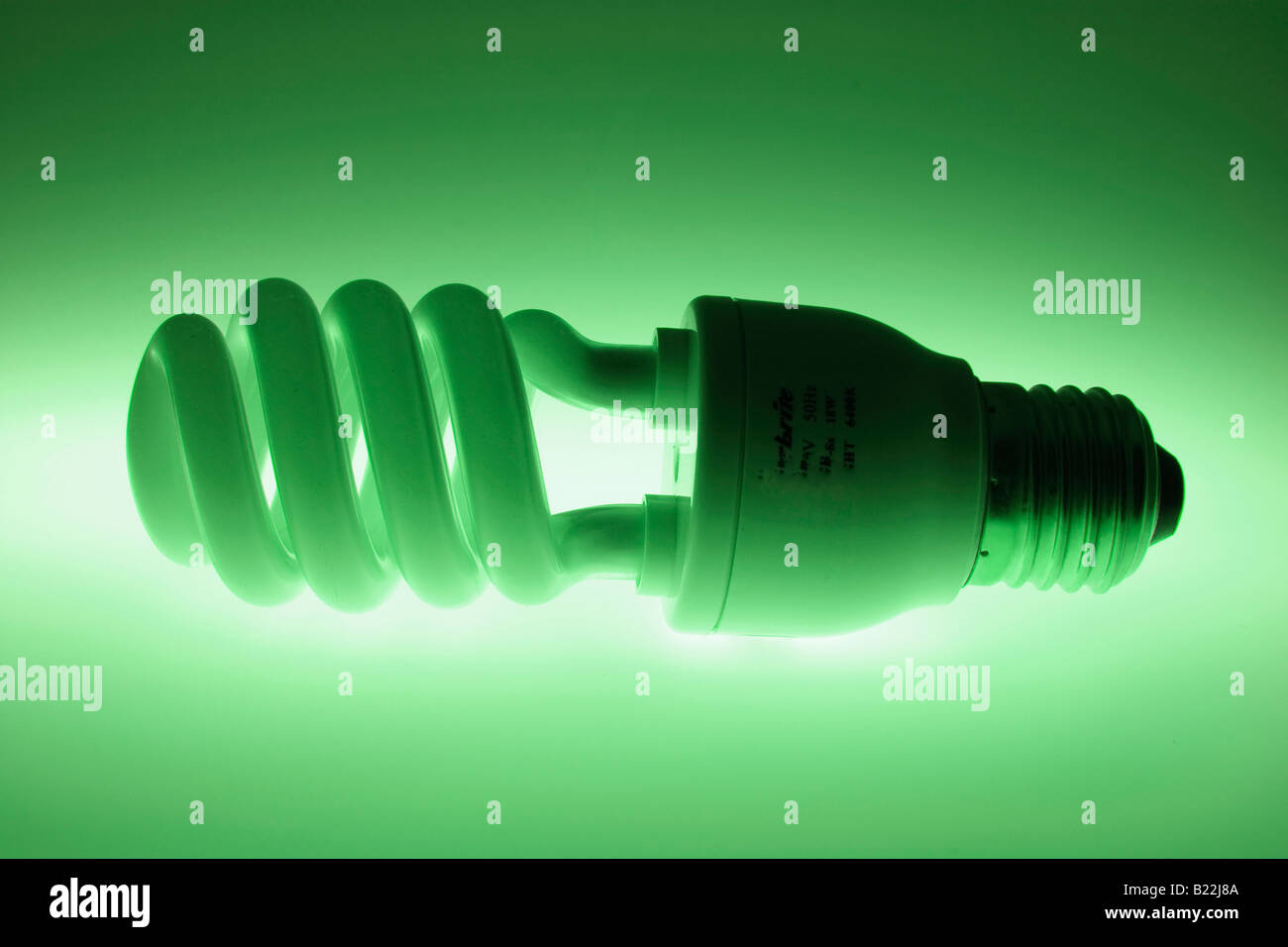 Compact Fluorescent Lightbulb in Green Tone Stock Photo - Alamy