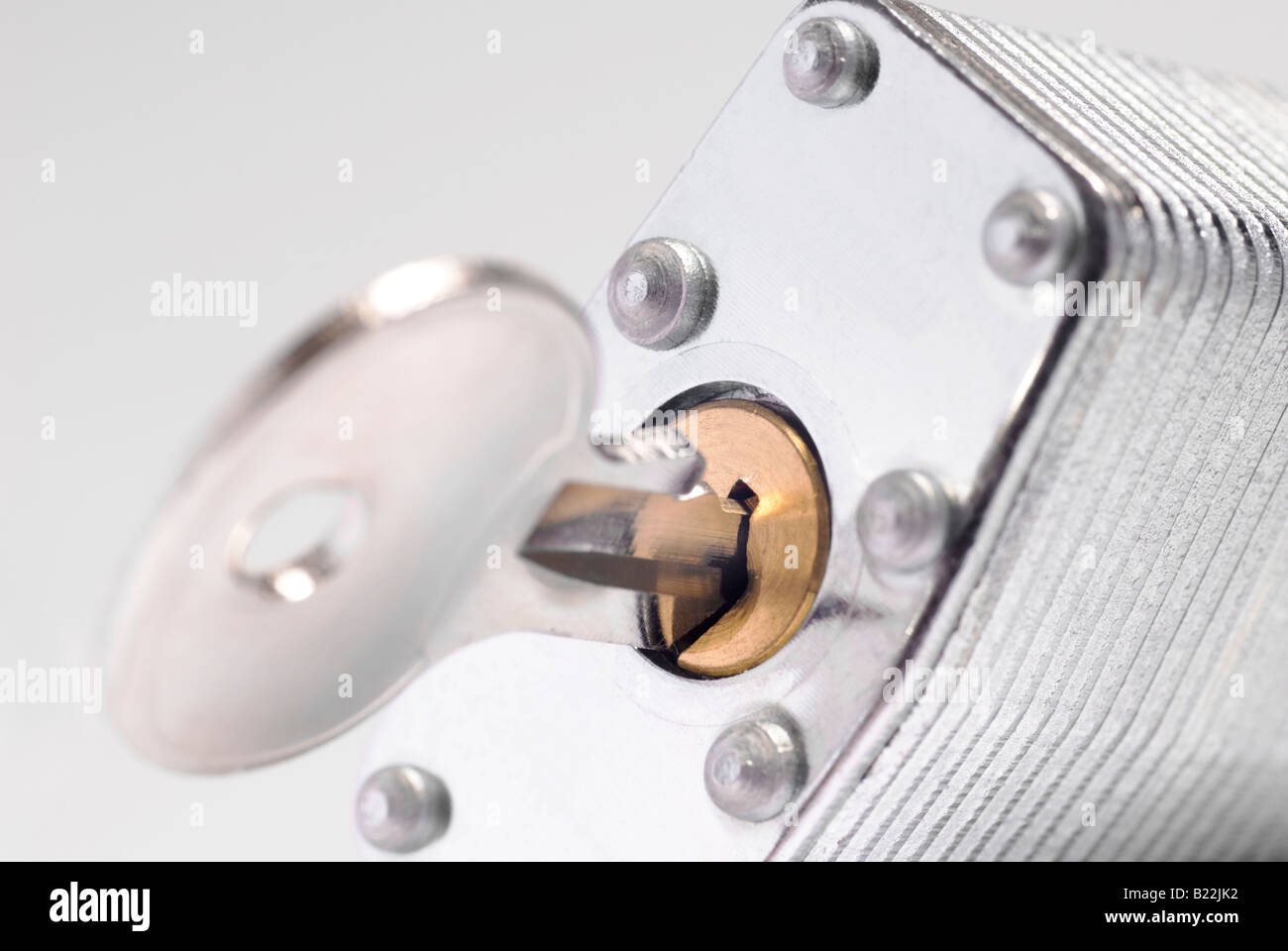 Key in a Padlock Stock Photo - Alamy