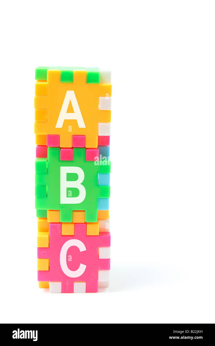 Stack of Alphabet Puzzle Cubes Stock Photo - Alamy