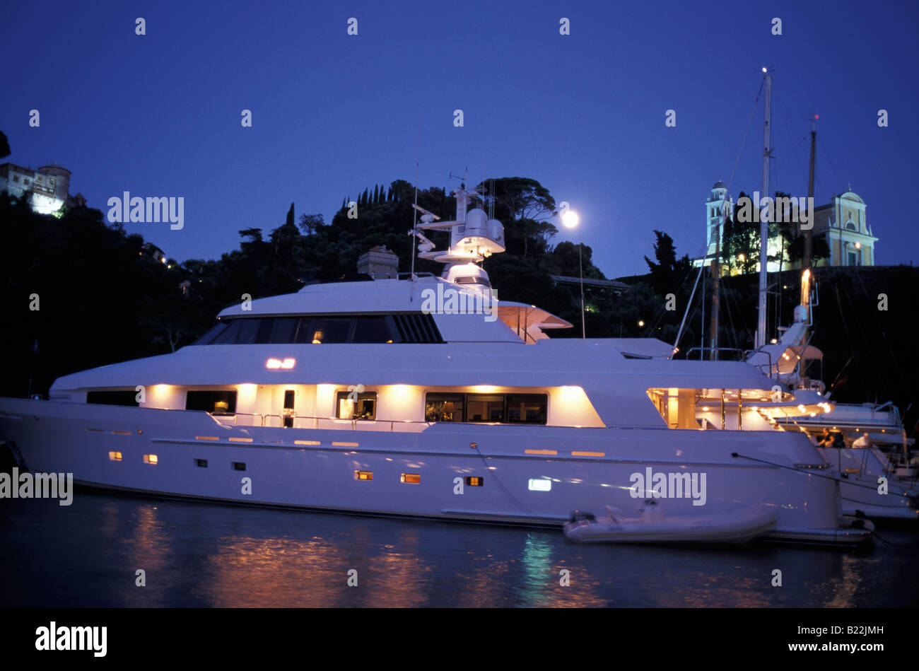 Illuminated yacht in harbour at night Portofino Liguria Italy Stock ...