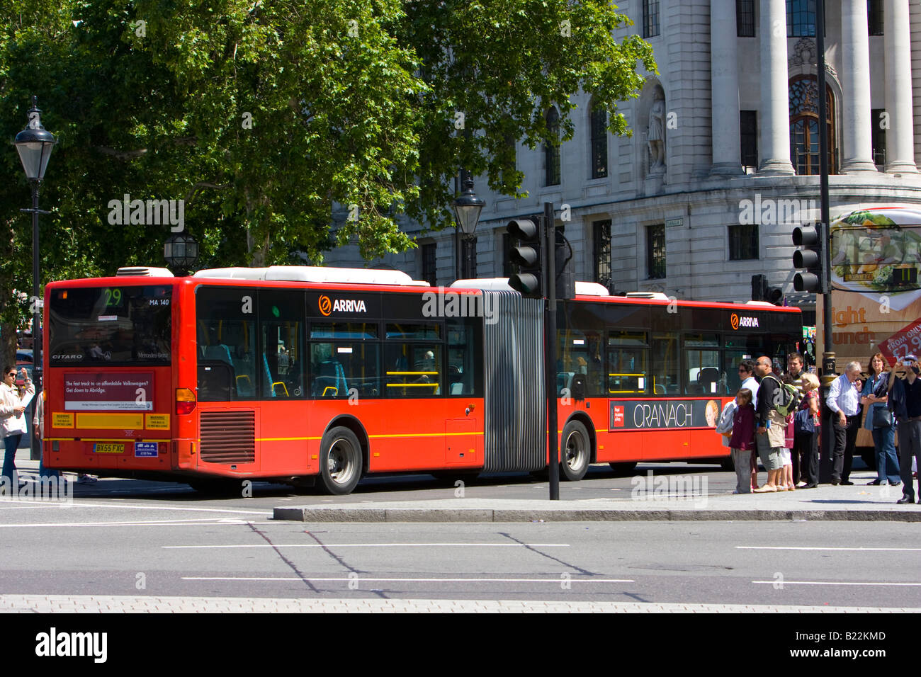 trafalgar square london bendy bus Stock Photo - Alamy