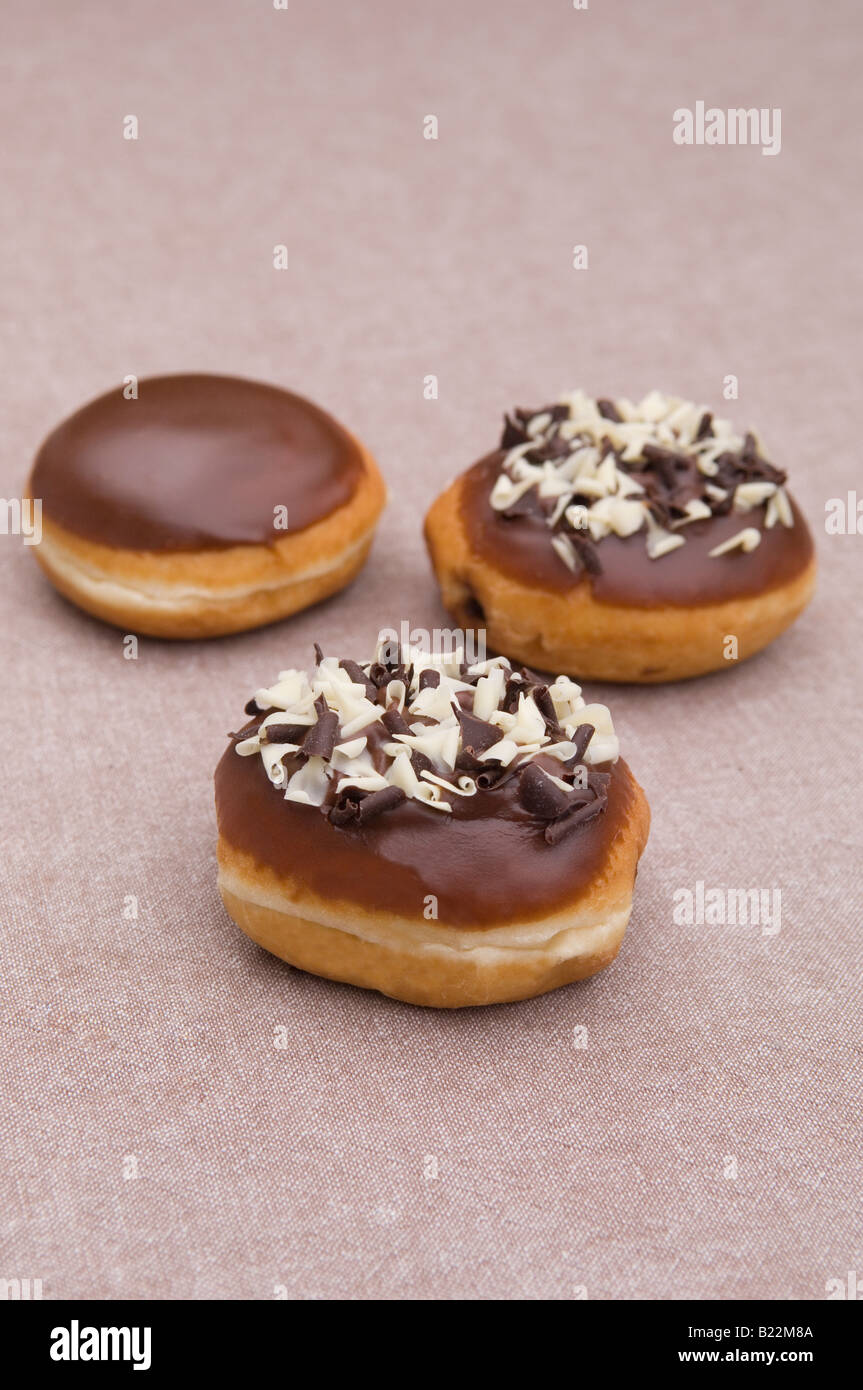 Chocolate covered donuts Stock Photo - Alamy