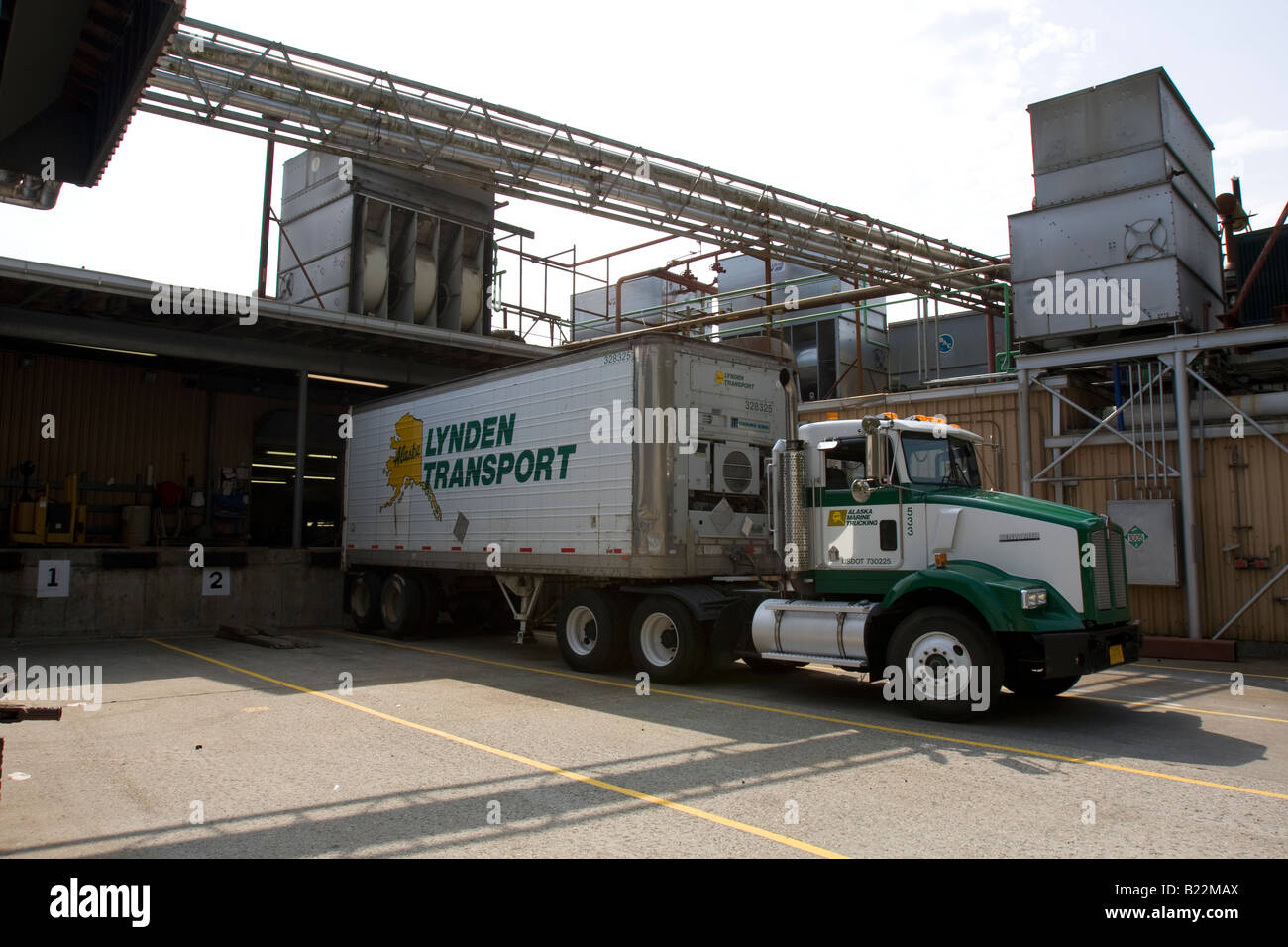 Lorry in the loading bay to a factory in Alaska Stock Photo - Alamy