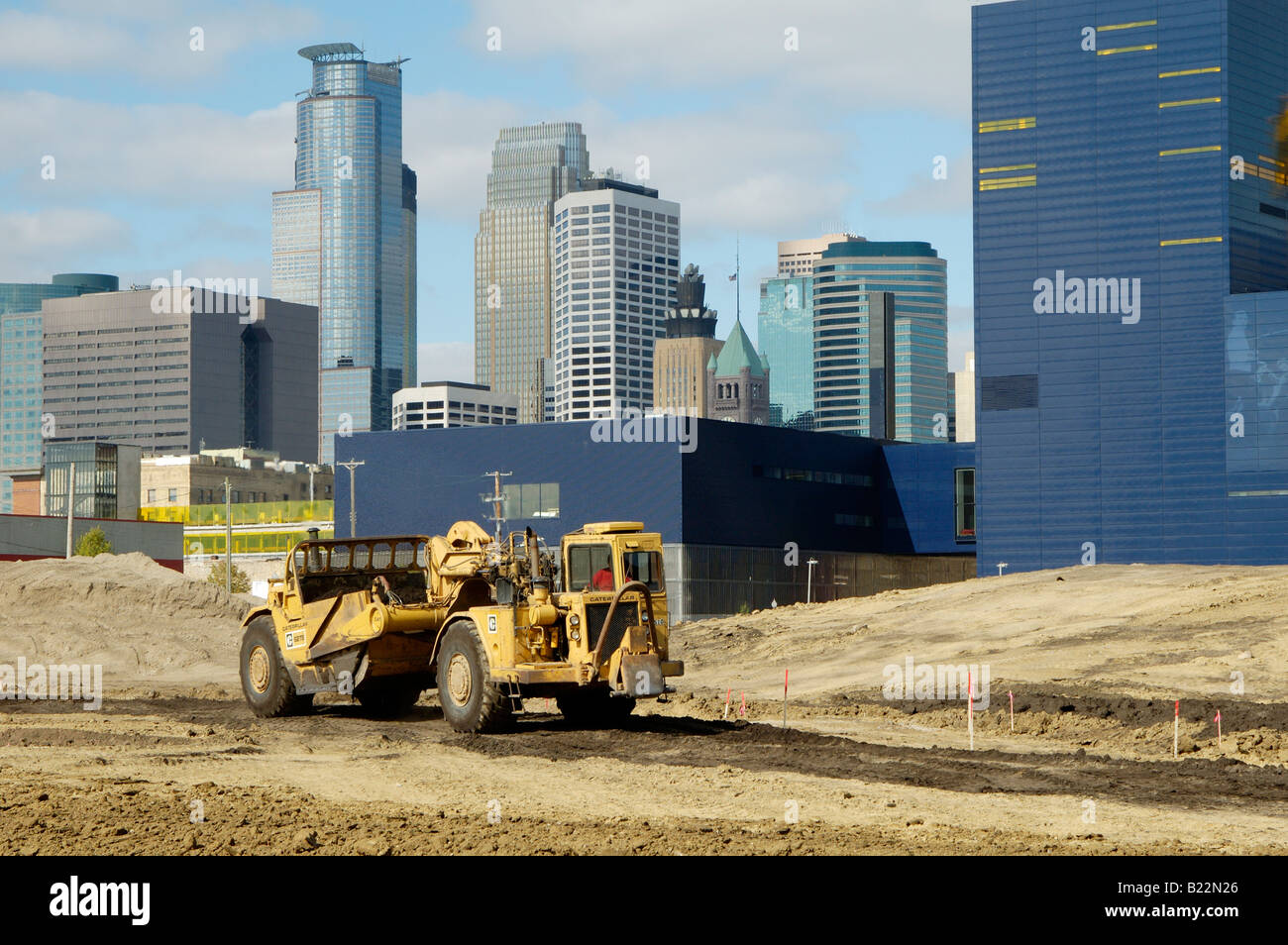 Construction equipment at work in an area being redeveloped in ...