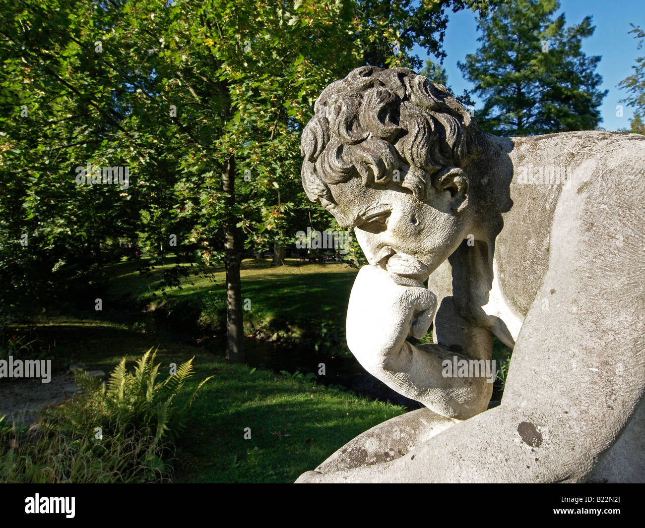 figure statue in the spa gardens in the town of Bad Orb Hesse Germany ...