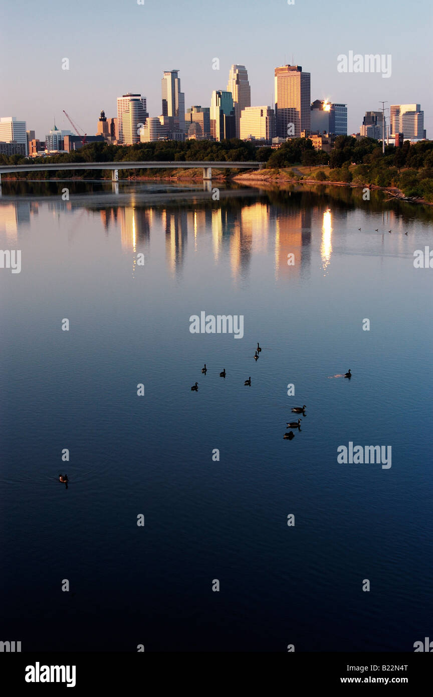 Minneapolis Minnesota skyline at dawn seen from a bridge across the ...