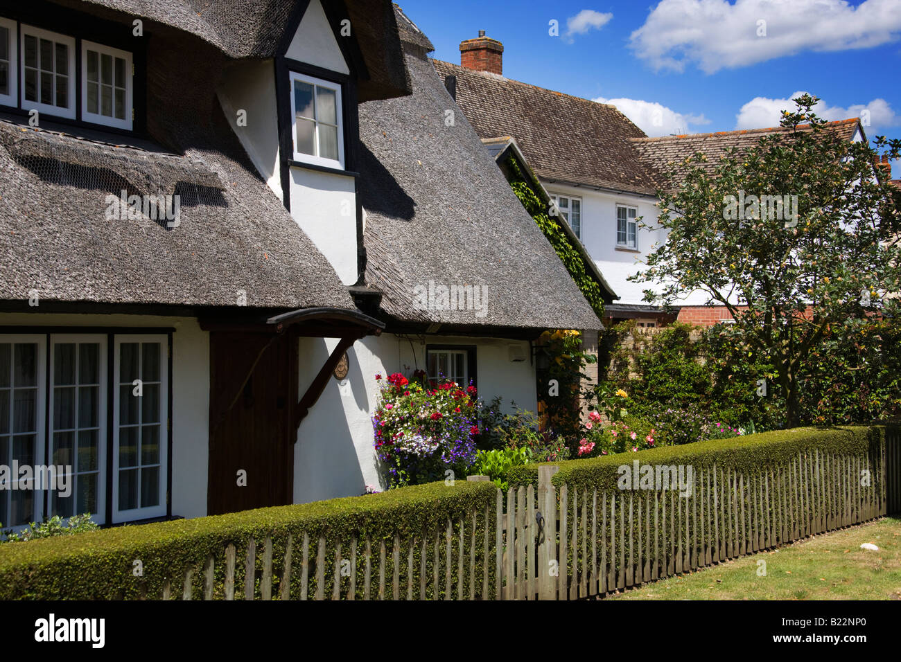 Traditional English Thatched Cottage In An Quite Village In The ...
