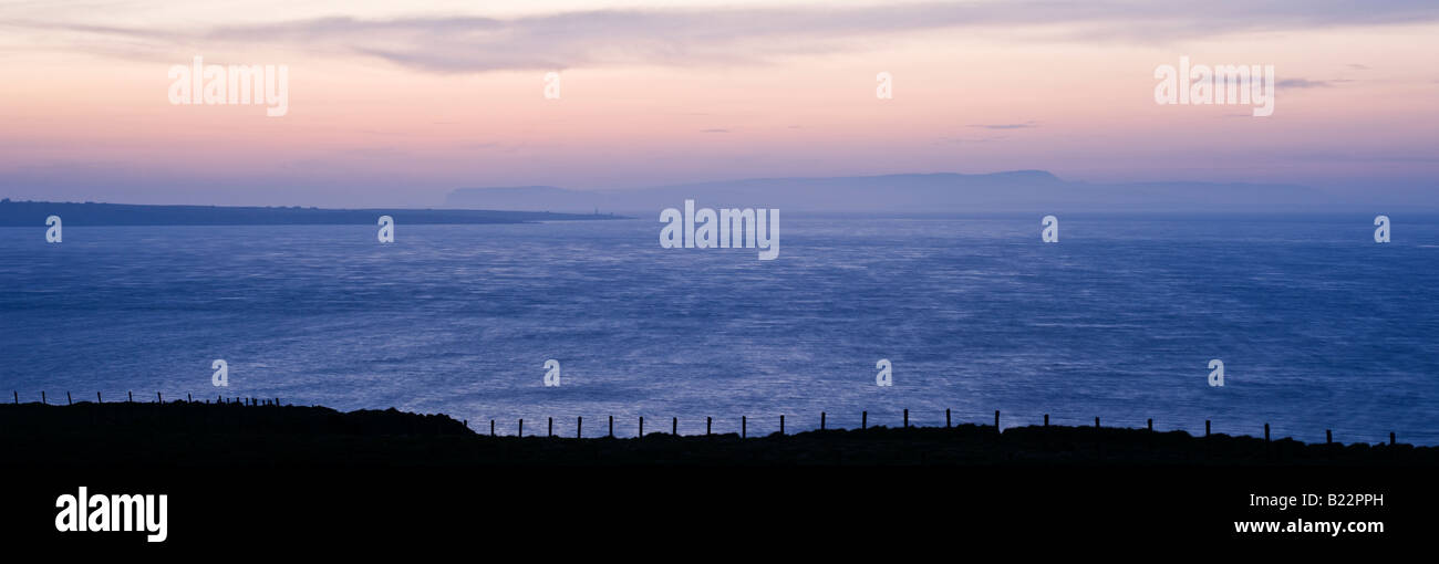 Pentland Firth with the island of Stoma and mistly cliffs of Hoy ...