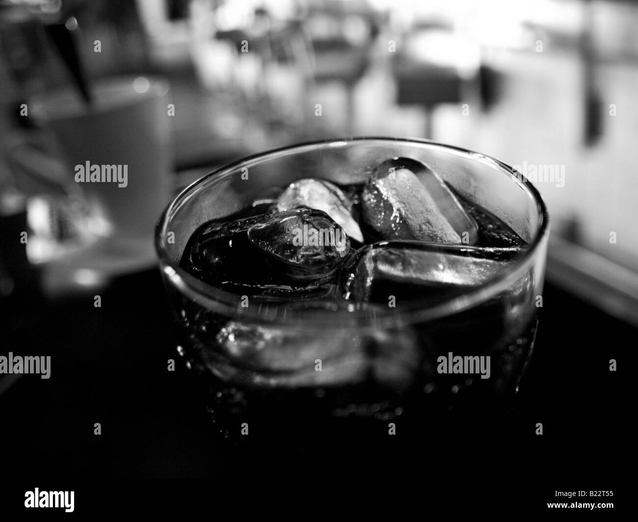 Close-up of drink with ice cubes on an table in the bar Stock Photo - Alamy