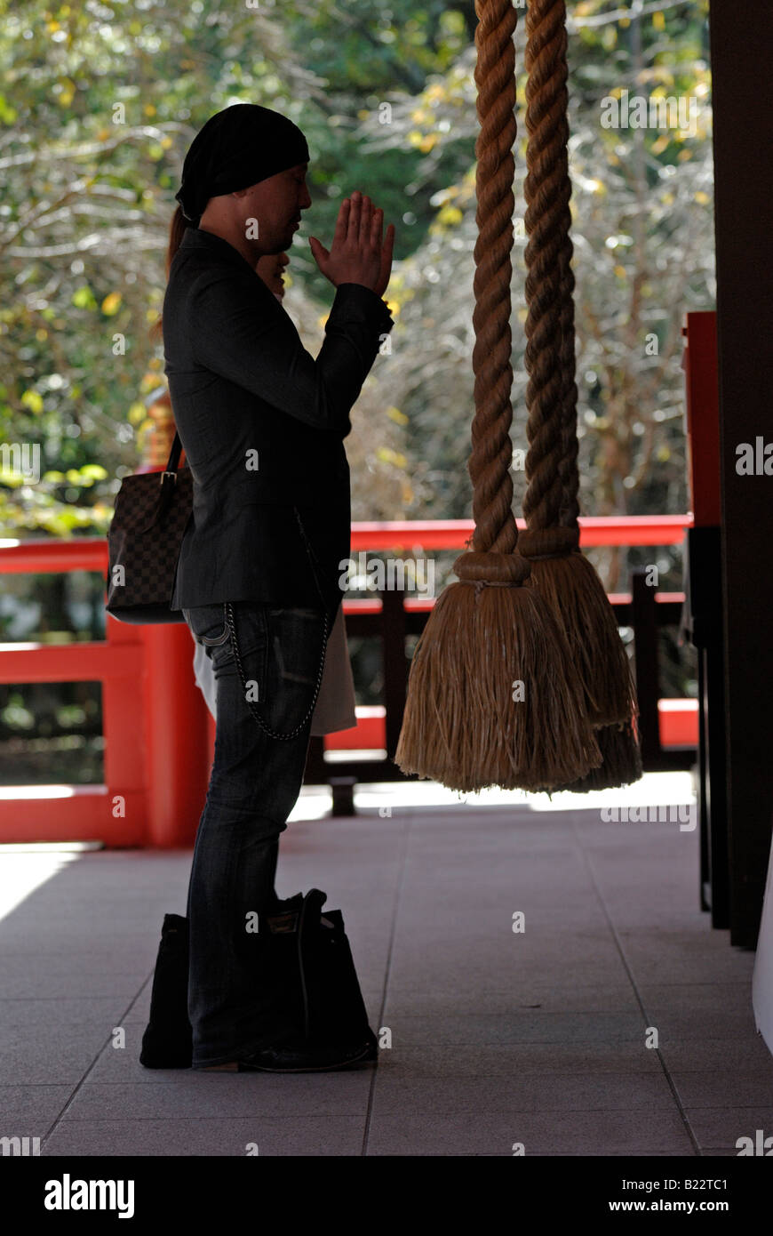 Young Japanese people praying in Gokoku Shrine Sendai Japan Stock Photo ...