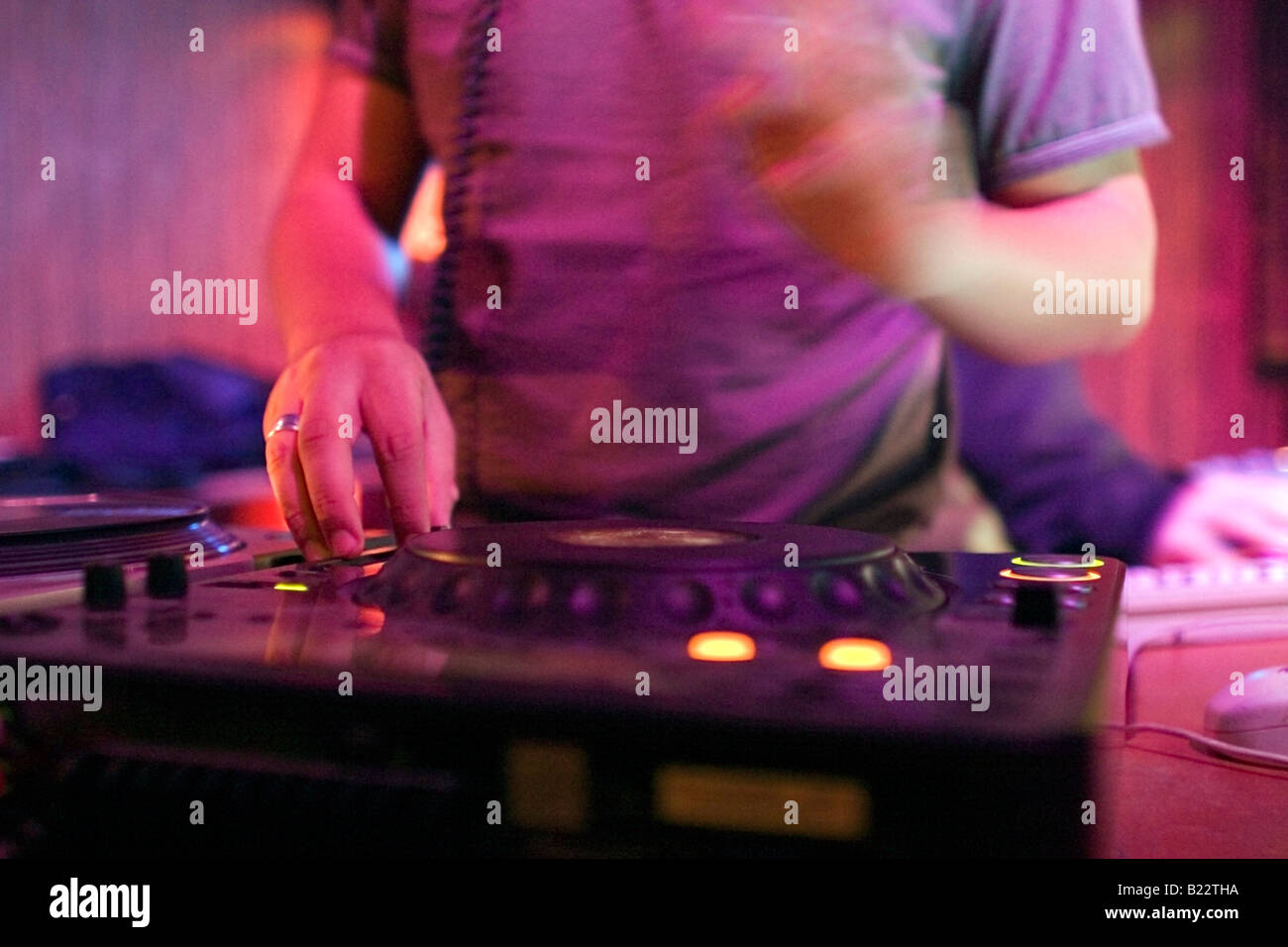 Colourful Close Up Shot of a DJ's Hands in Action Mixing a CD Stock ...