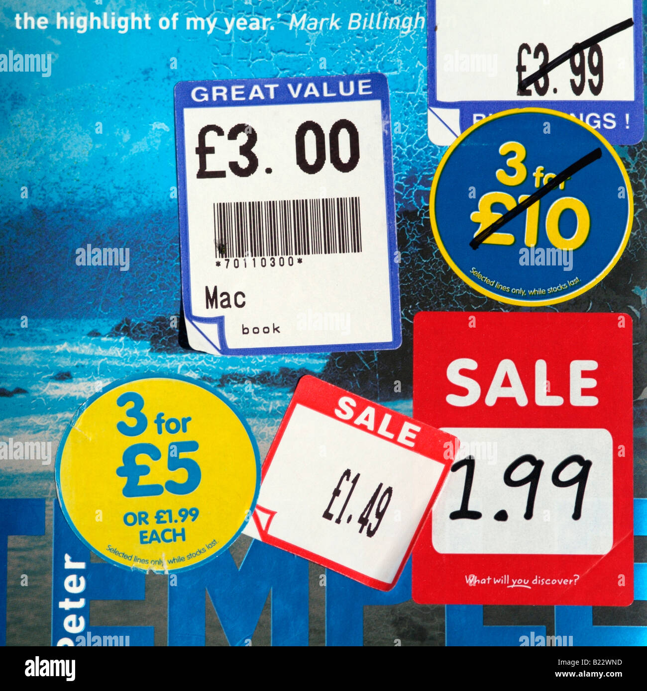 Book sale stickers advertising reduction in cost Stock Photo - Alamy