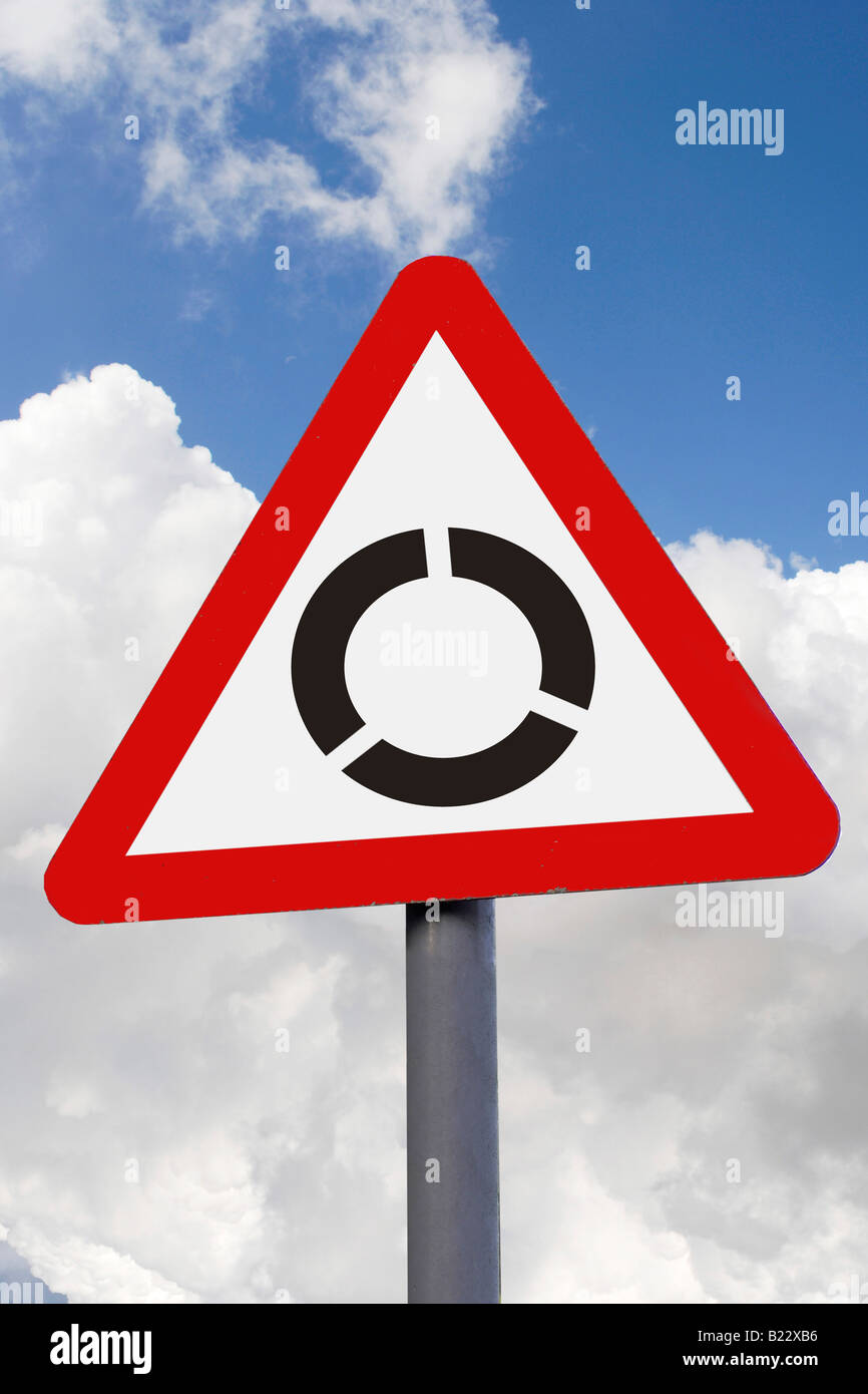 British Triangular road sign warning drivers that a roundabout is ...
