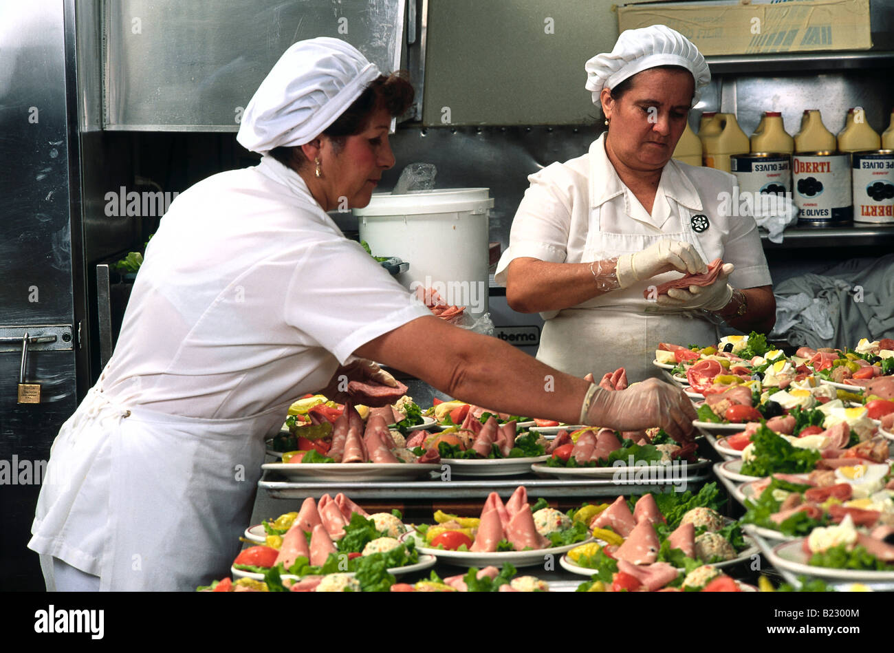 Female chefs preparing salad Stock Photo - Alamy