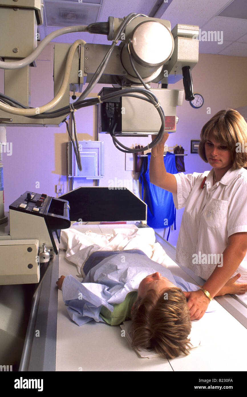 Female doctor taking medical scan of patient Stock Photo - Alamy