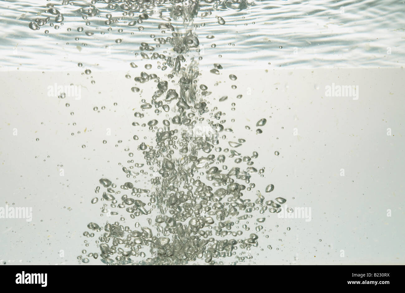 water pouring to a tank Stock Photo - Alamy