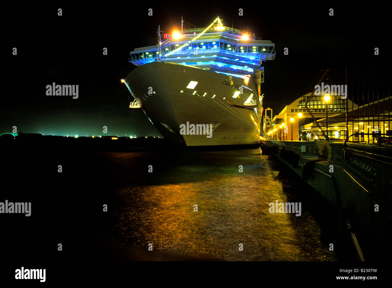 Cruise ship lit up at port Stock Photo - Alamy