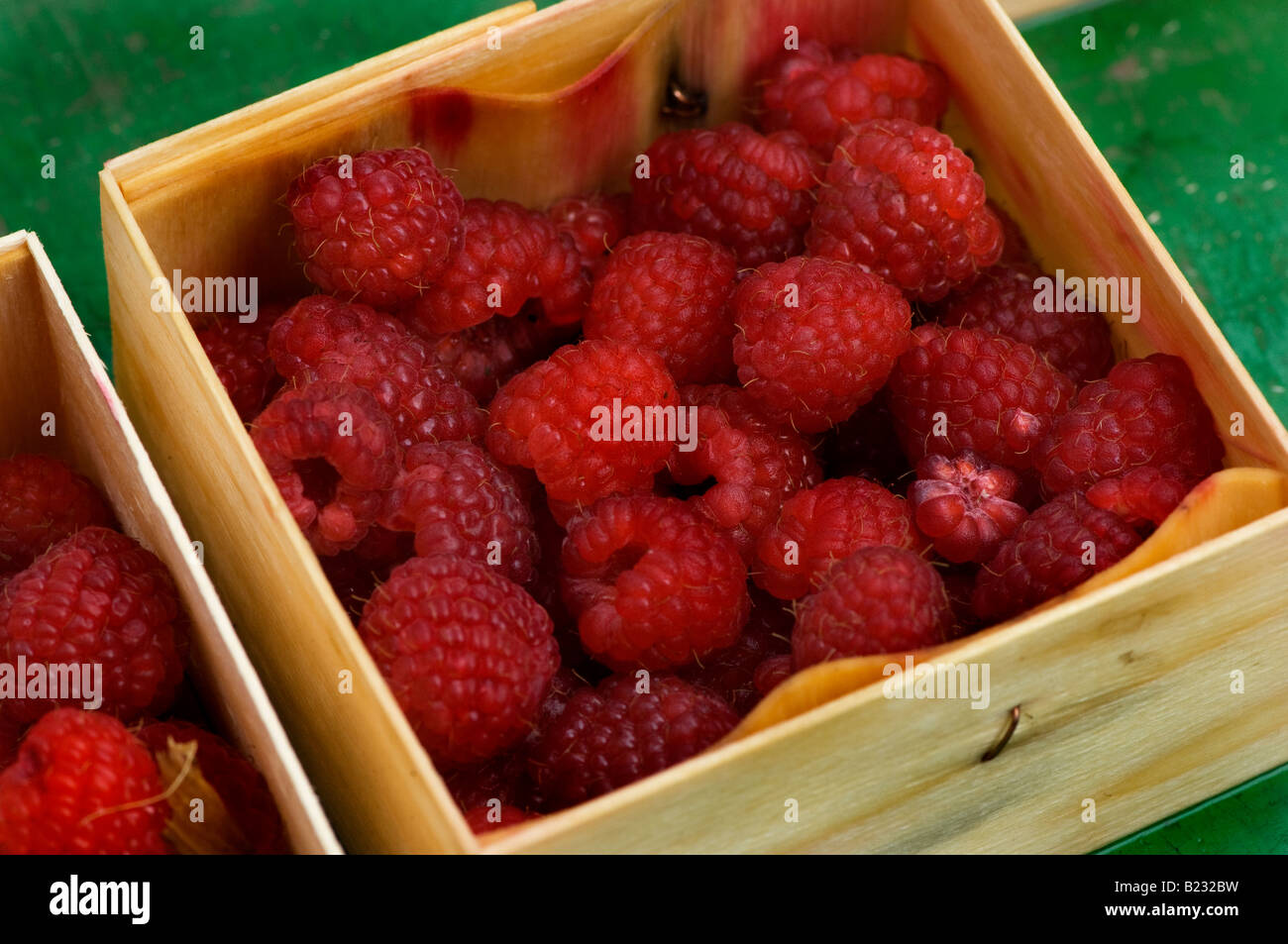 Raspberries on a table at a farmers market, Chicago, Illinois, USA ...