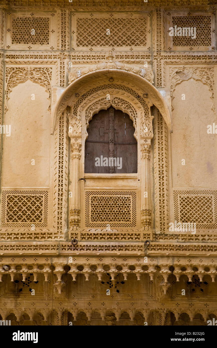Arched window and carved sandstone details in the fort of Jaisalmer ...