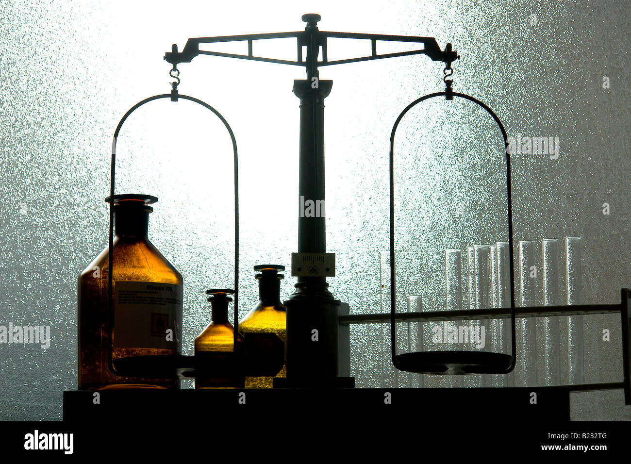 Medicine bottles with weighing scale Stock Photo - Alamy