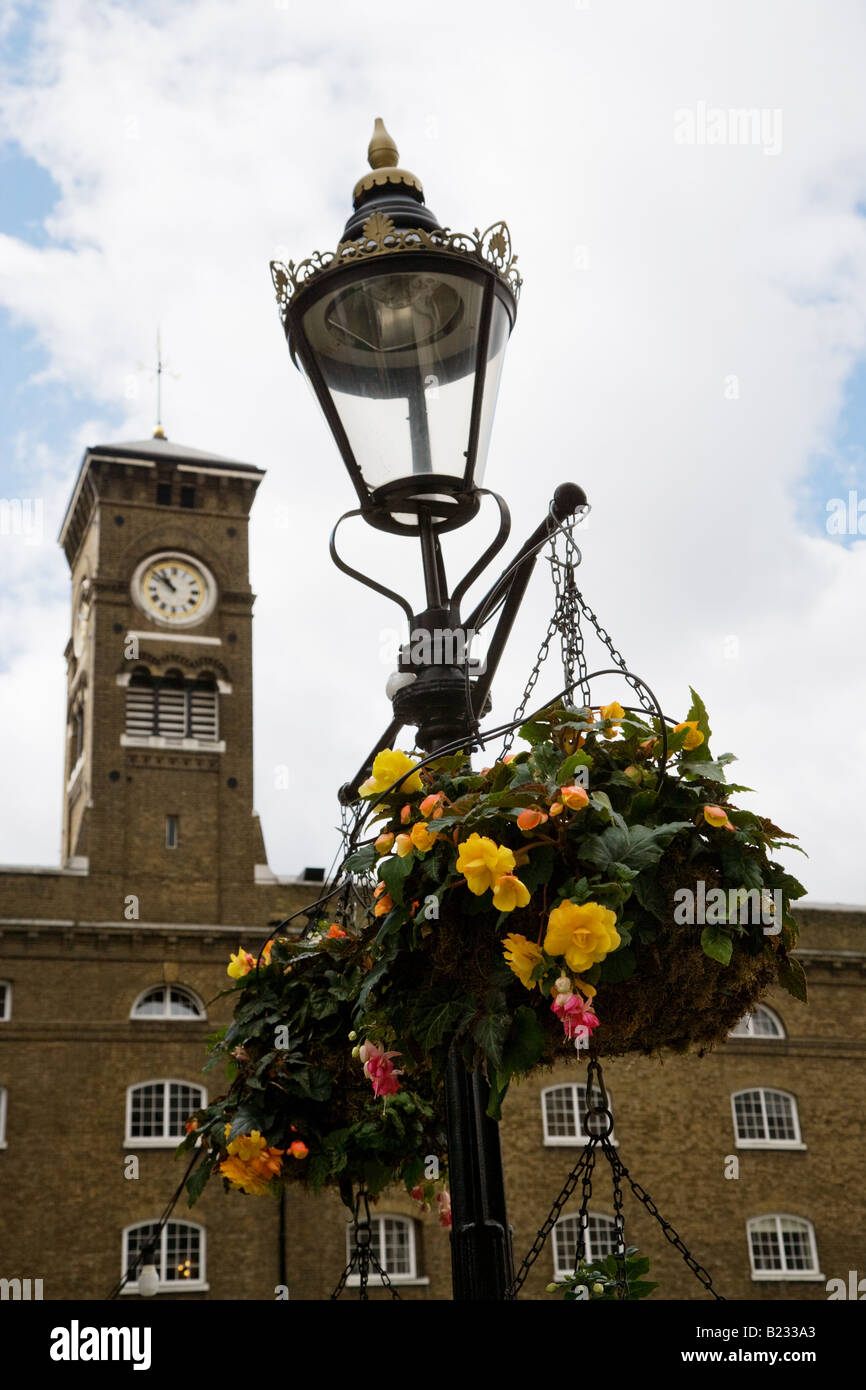 Hanging basket of flowers on a lamp post at St Katharine's Dock, London ...