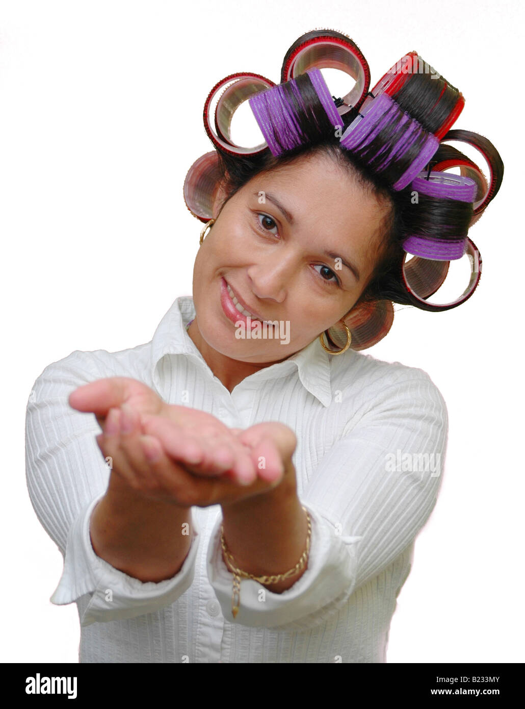 Woman wearing hair rollers Stock Photo - Alamy
