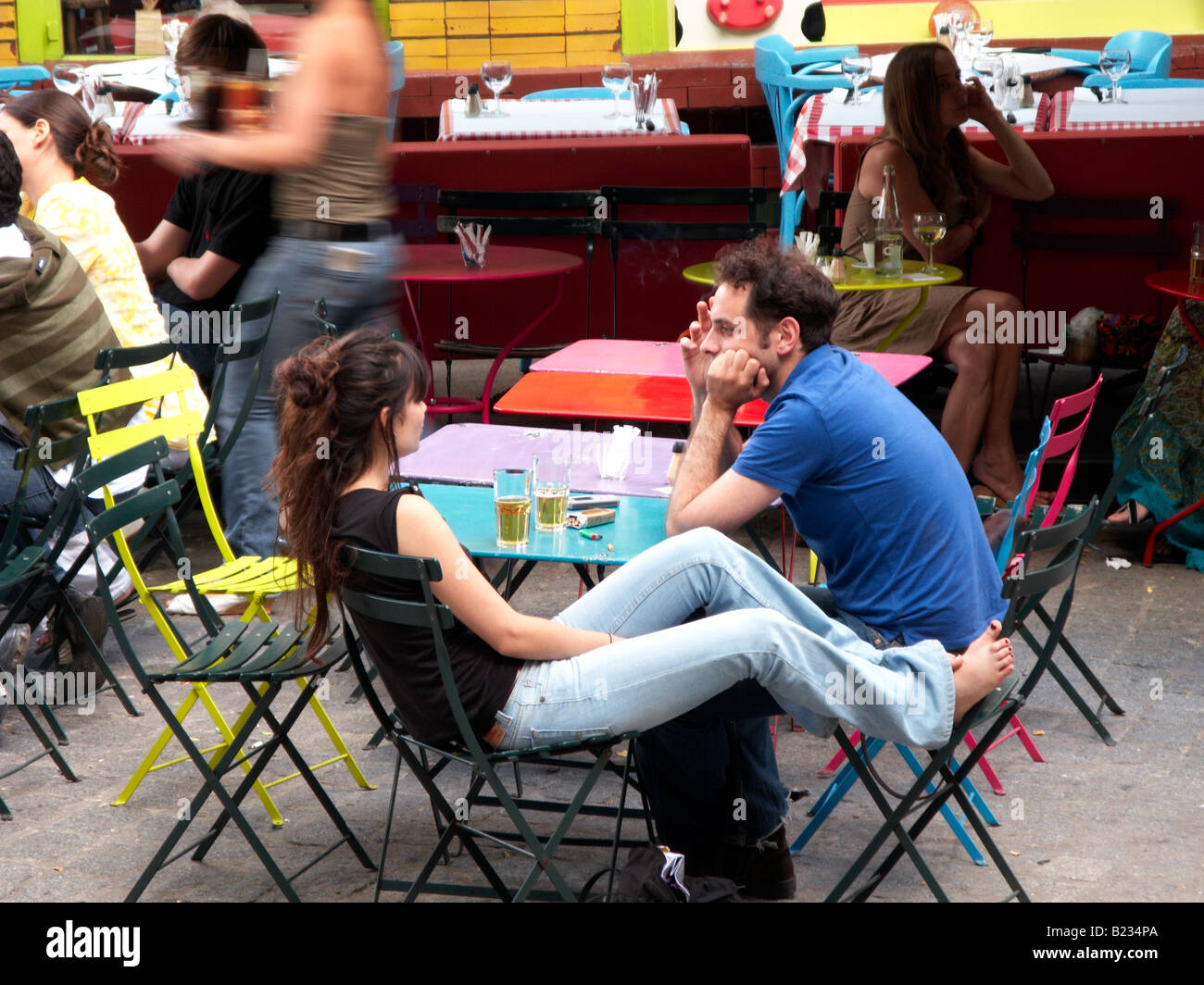 ATMOSPHERIC FRENCH CAFE SCENE WITH YOUNG PEOPLE, MONTMARTRE FRANCE ...