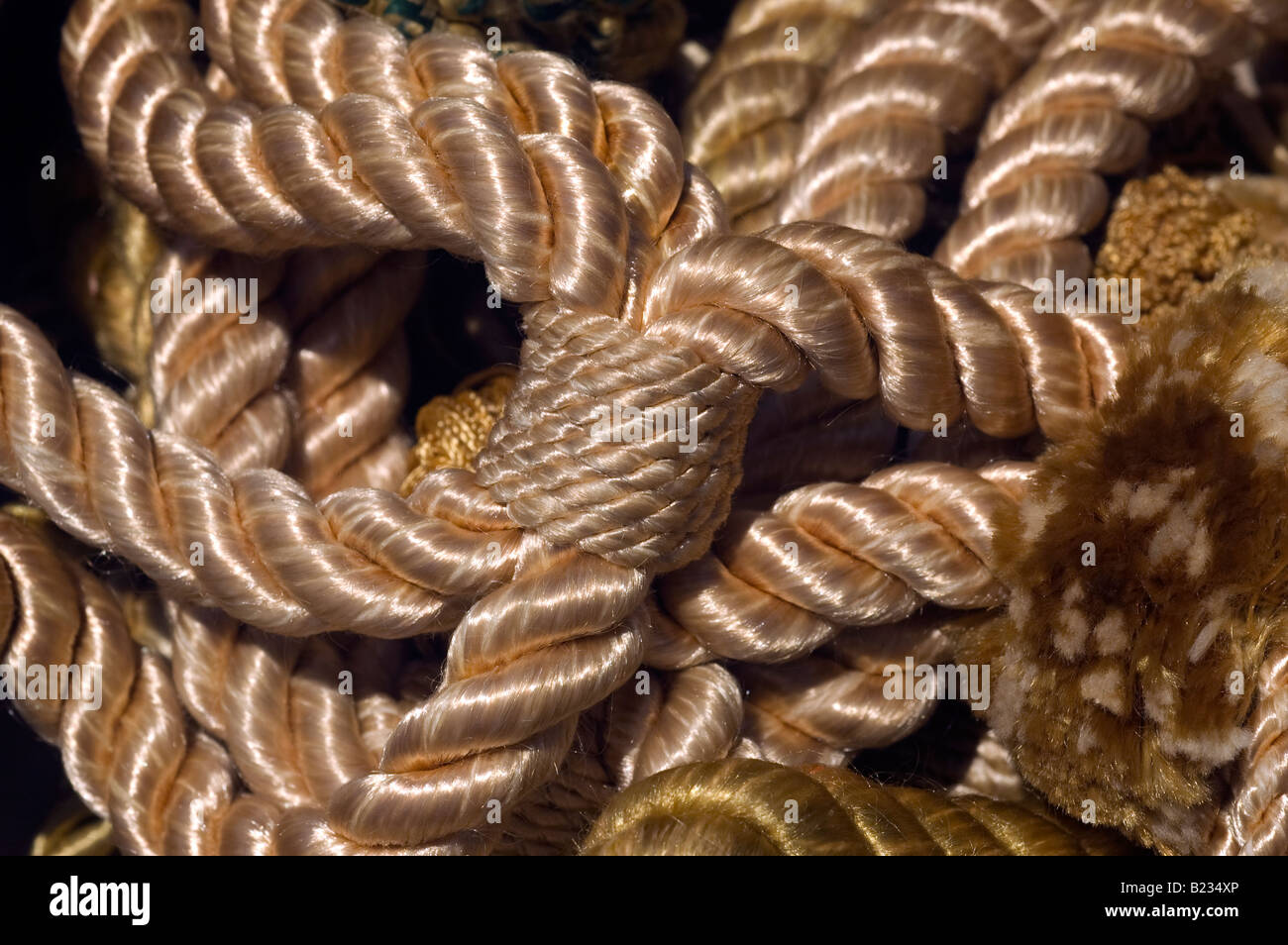 Gold cords hi-res stock photography and images - Alamy