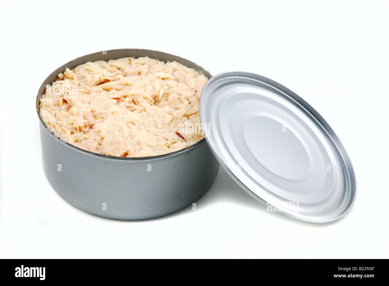 Open can of tuna fish with fork isolated on a white background Stock ...
