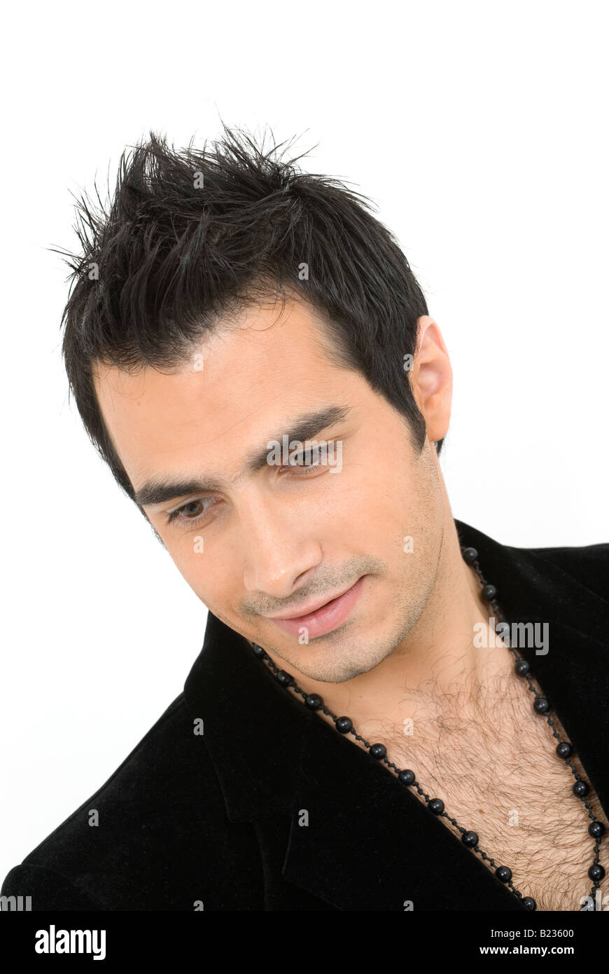 Good looking young male fashion model against a white background Stock ...