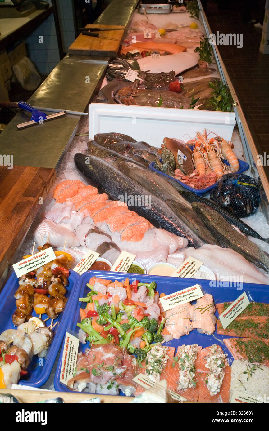 Display of fish and seafood specialities at a fish market counter in ...