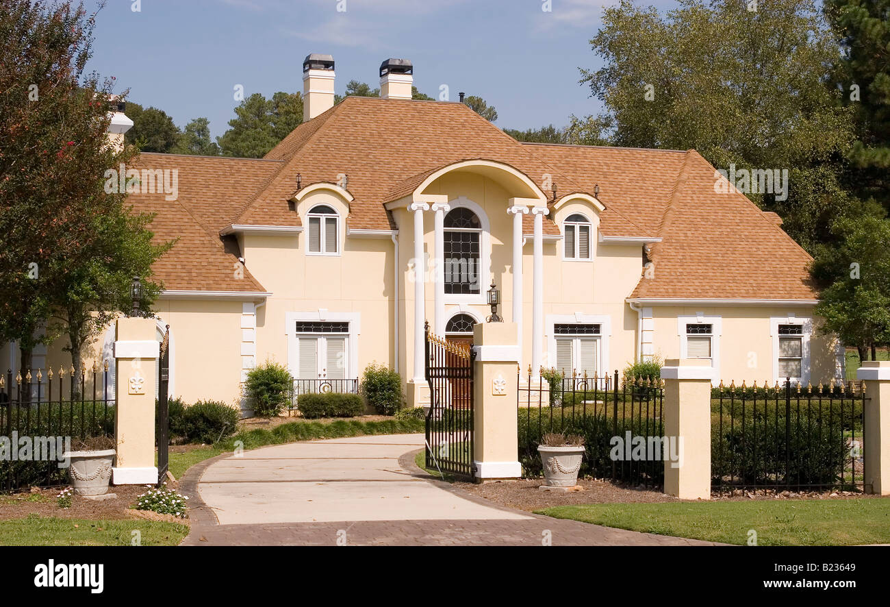 A nice home of peach colored stucco Stock Photo - Alamy