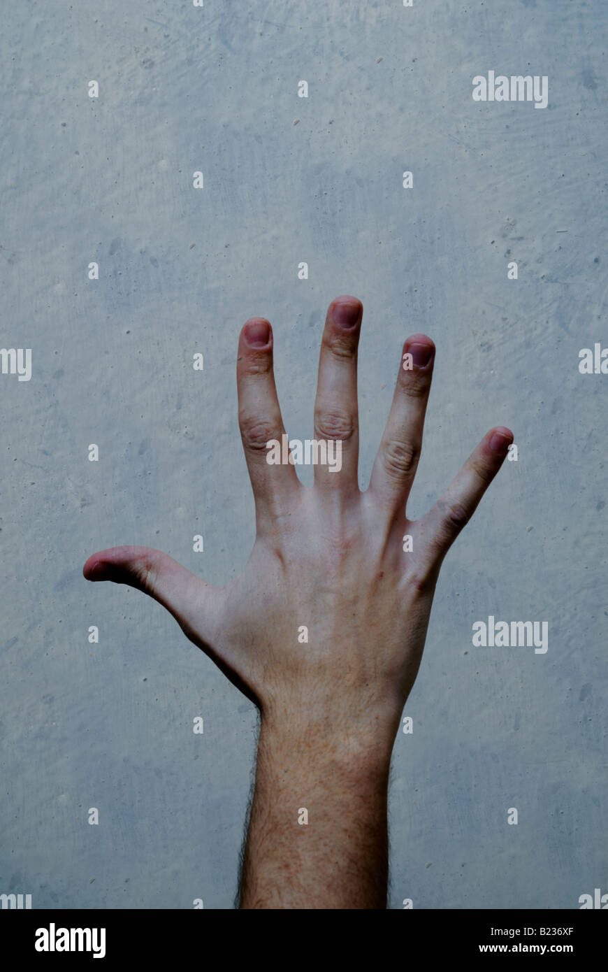Back of man's hand reaching out Stock Photo - Alamy